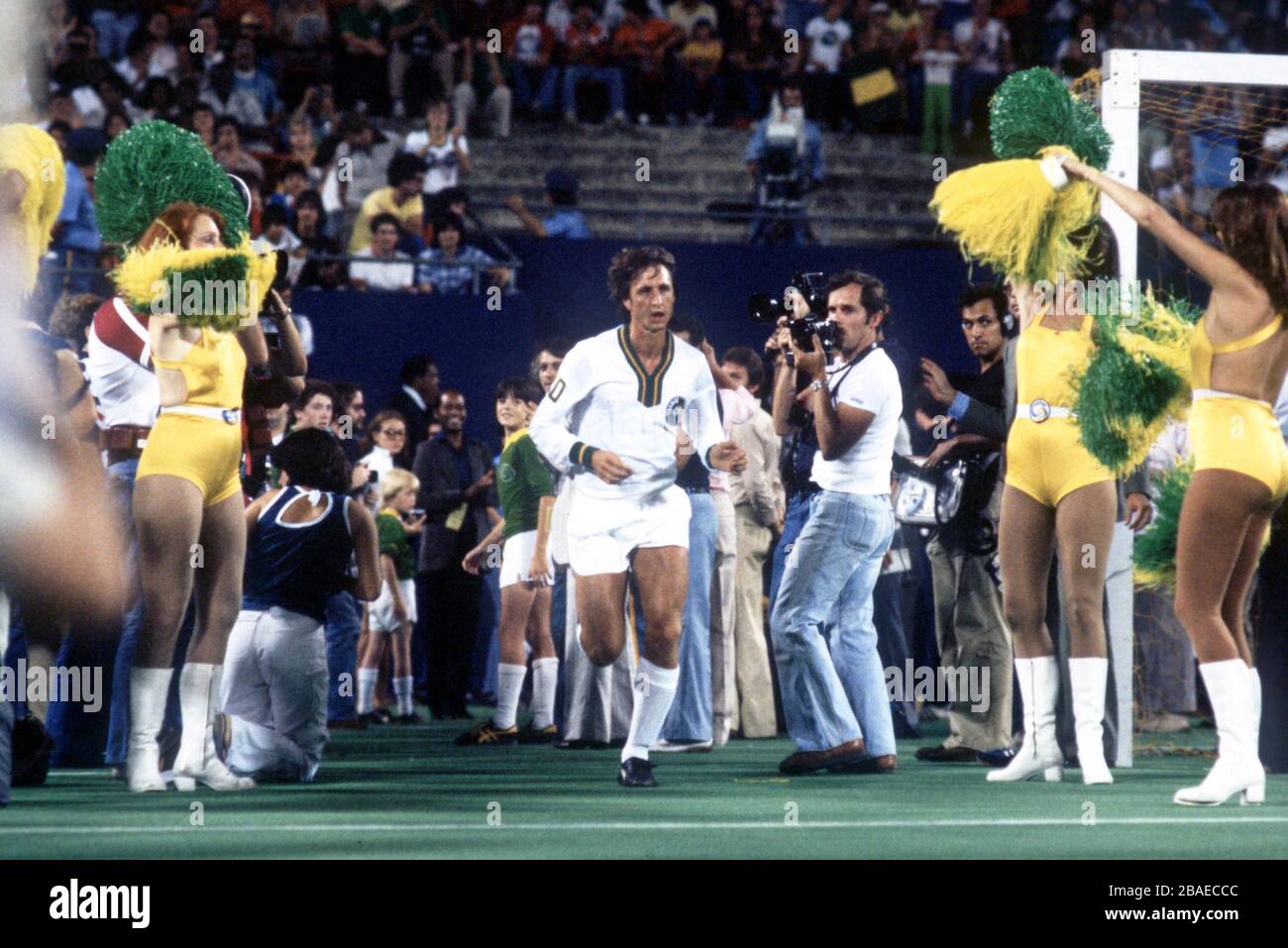 Is cheered onto the pitch by the cosmos cheerleaders hi-res stock ...