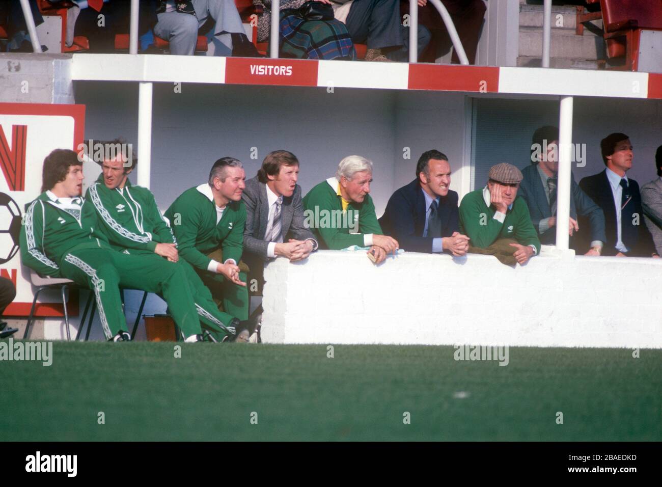 (L-R) The attention of all on the bench is firmly focussed on the match ...