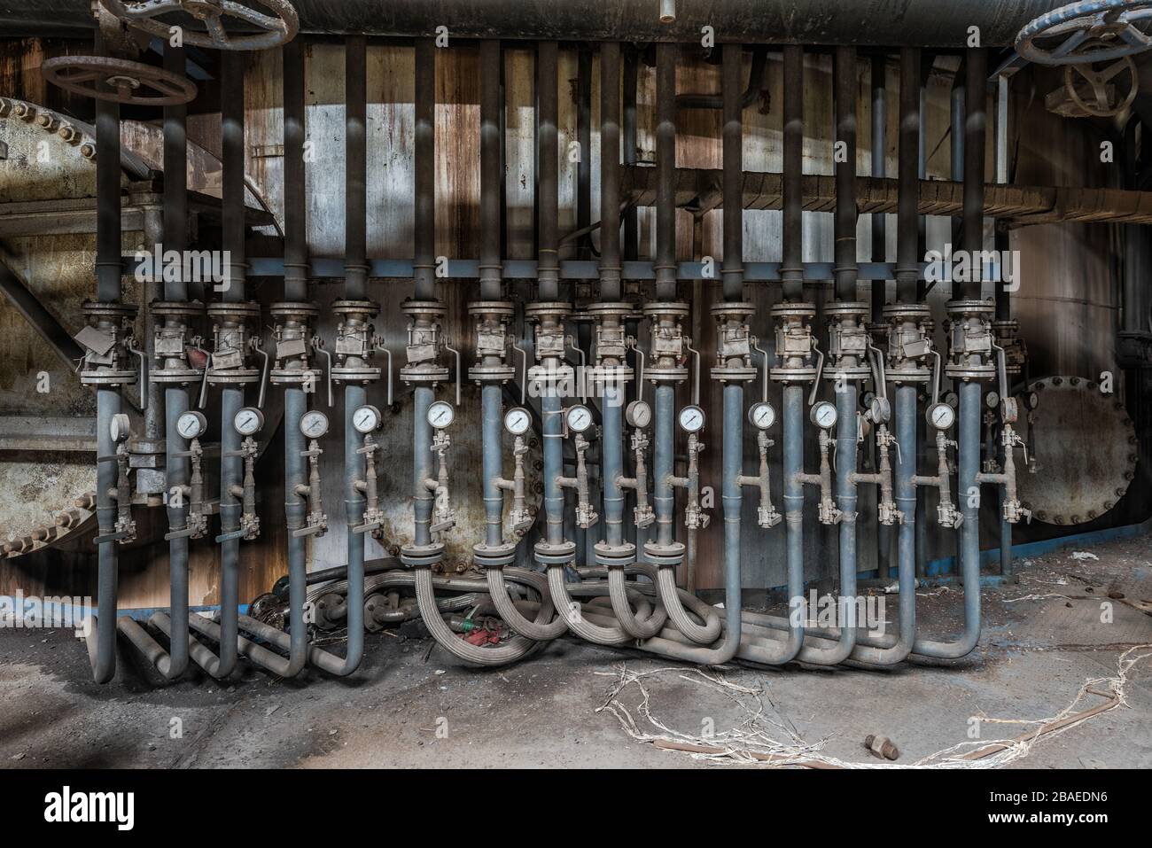 Interior of an old abandoned industrial steel factory Stock Photo - Alamy