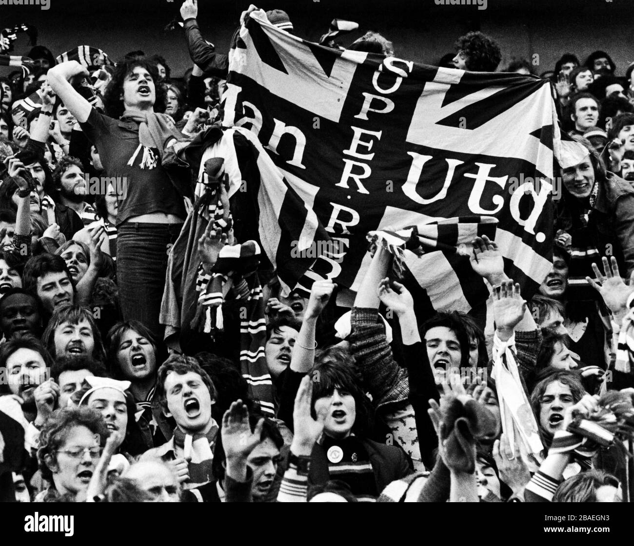 Manchester United's Red Army cheer on their side Stock Photo - Alamy
