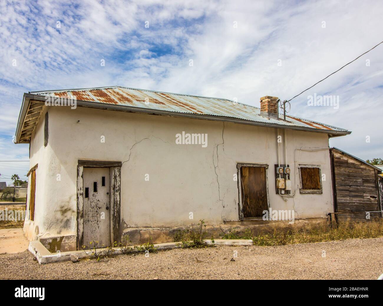 Abandoned One Level Home With Boarded Up Windows Stock Photo - Alamy