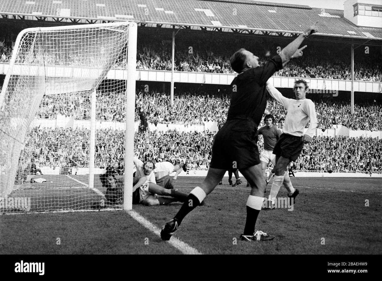 The referee signals a goal as Tottenham Hotspur's Martin Chivers (r ...