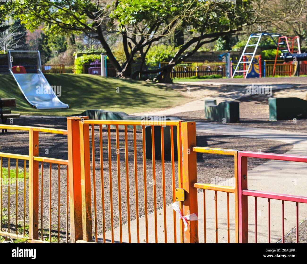 Playground gate tied closed as social distancing takes effect during ...