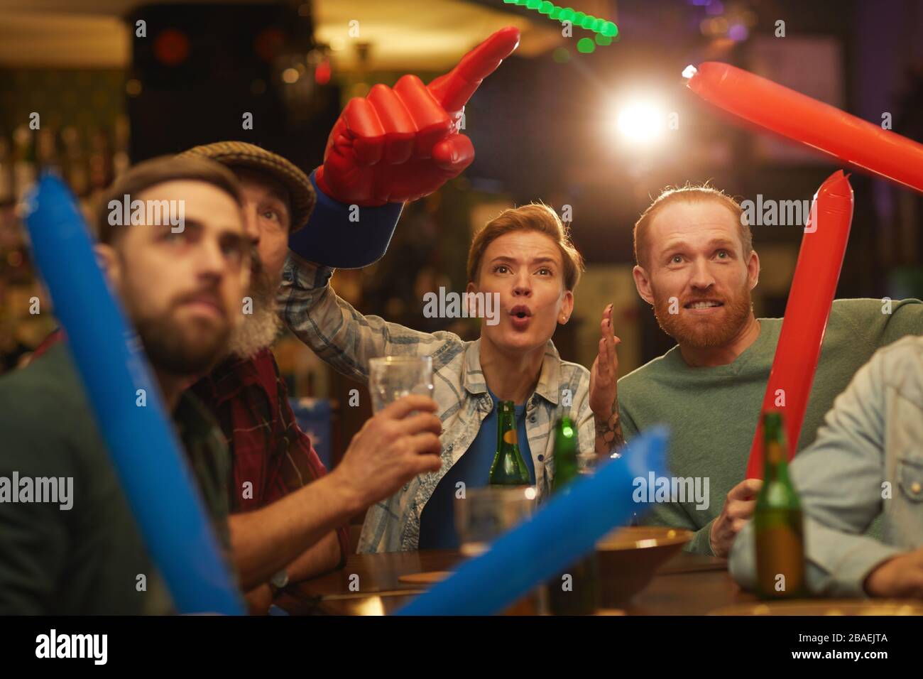 Football fans cheering in bar hi-res stock photography and images - Alamy