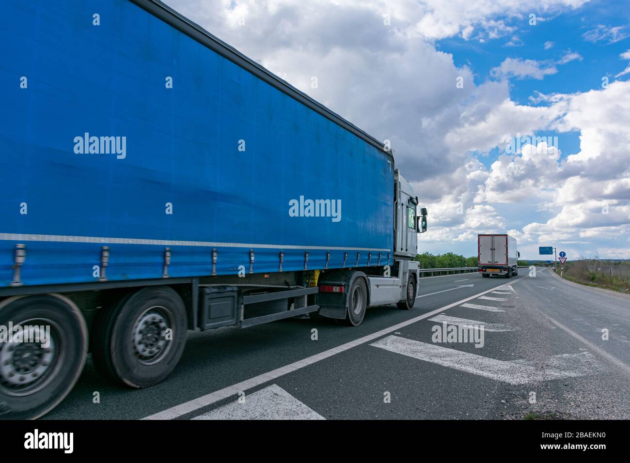 Truck with canvas semi-trailer with side opening for general transport ...