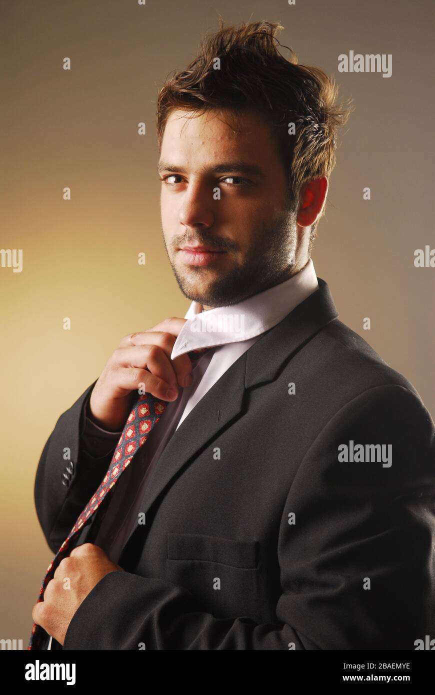 Knotting a tie hi-res stock photography and images - Alamy