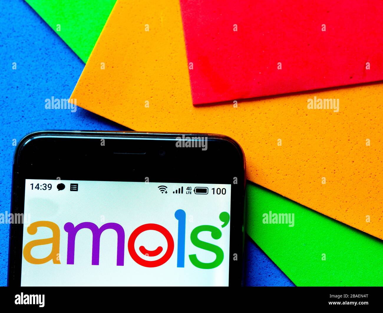 In this photo illustration Amols’ logo is seen displayed on a ...