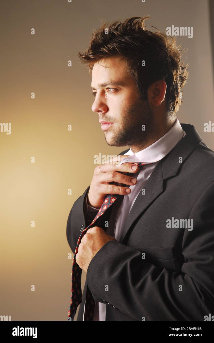 Knotting a tie hi-res stock photography and images - Alamy