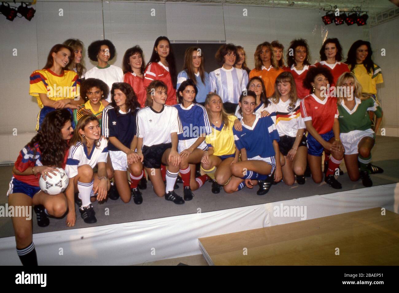 Girls, young women in the jerseys of the participating countries ...