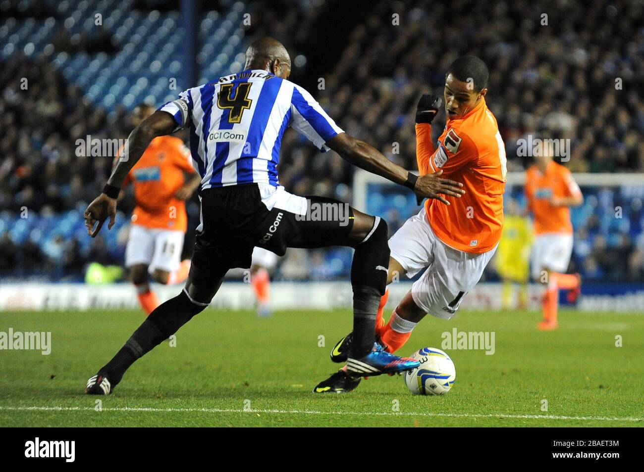 Sheffield Wednesday's Anthony Gardner (left) and Blackpool's Tom Ince ...