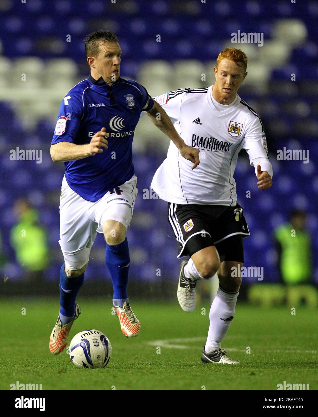 Birmingham City's Steven Caldwell (left) is chased by Bristol City's ...
