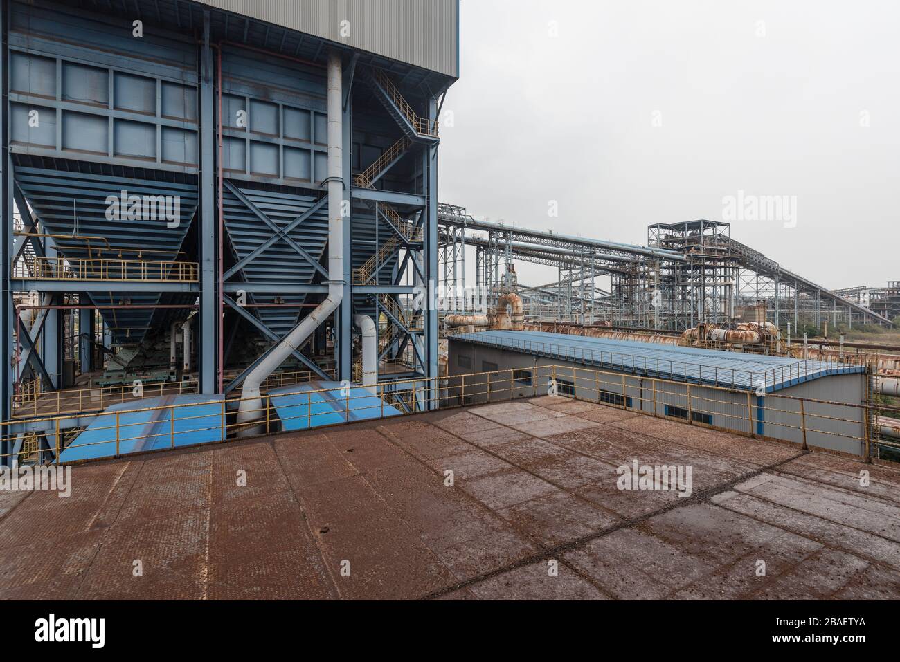 Interior of an old abandoned industrial steel factory Stock Photo - Alamy