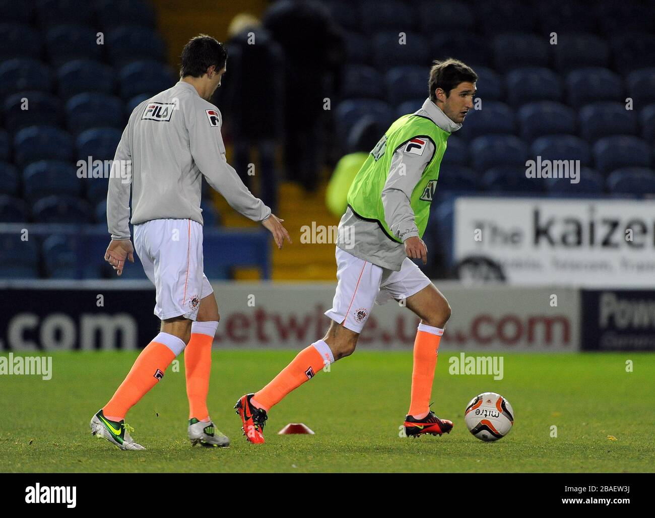 Blackpool's Chris Basham and his team-mates warm up before the game ...