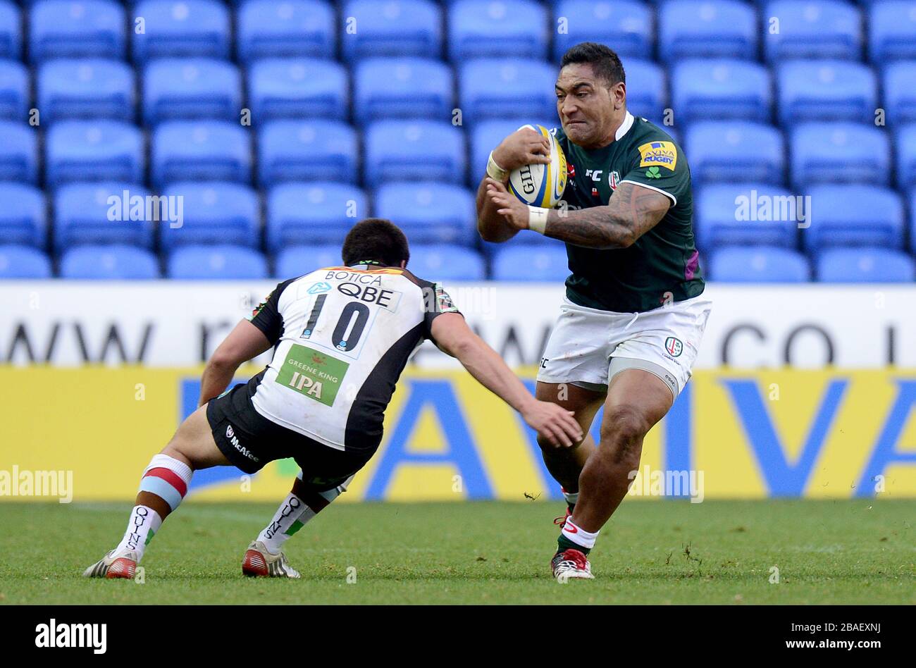is challenged by Harlequins' Ben Botica Stock Photo - Alamy