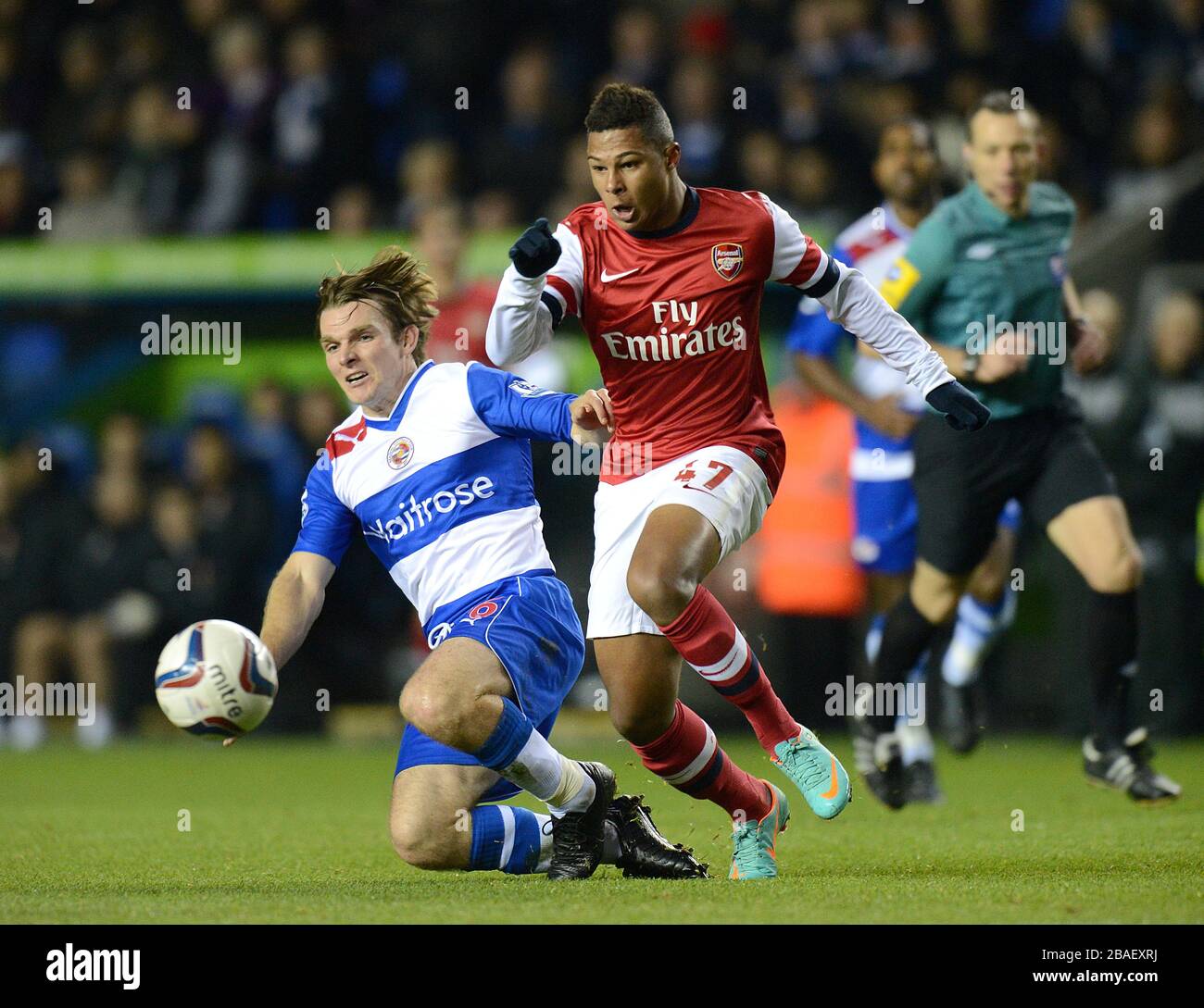 Reading's Jay Tabb (left) and Arsenal's Serge Gnabry (right) battle for ...