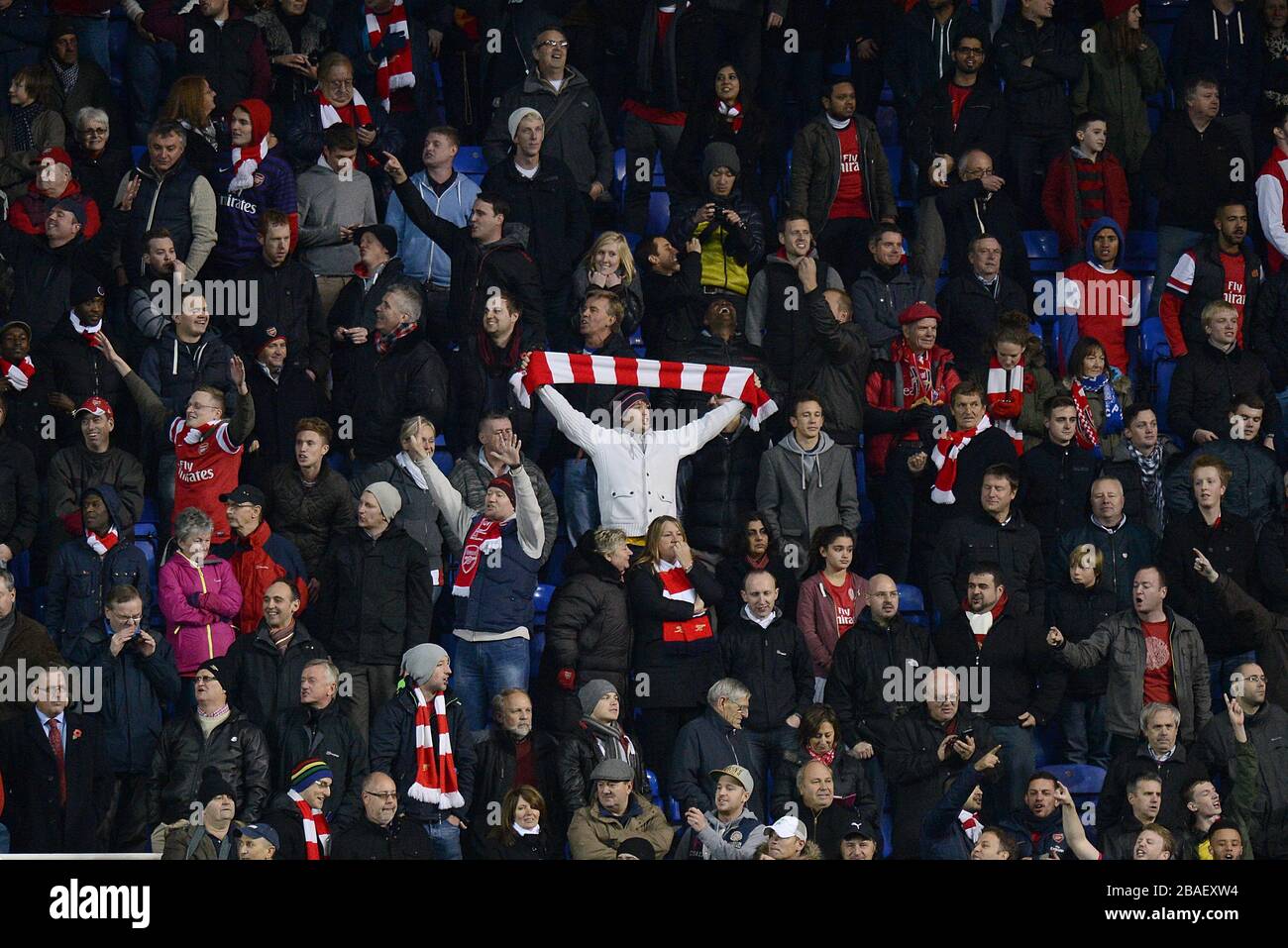 Arsenal fans in the stands Stock Photo - Alamy