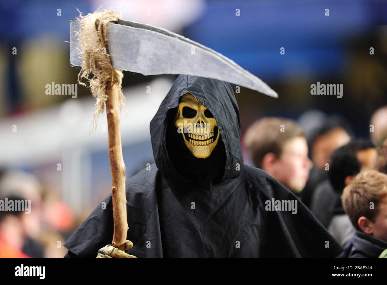 Football fans in Hallowe'en fancy dress in the stands before kick-off ...