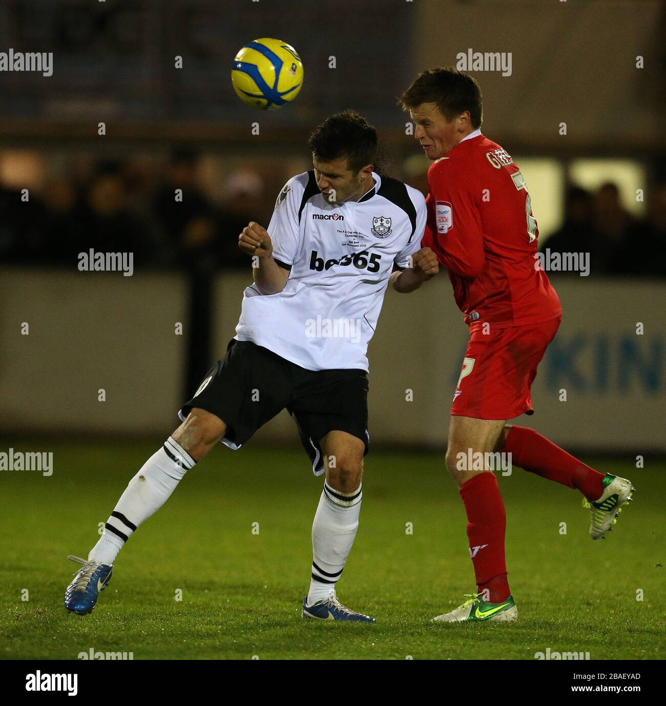 Cambridge City's Mitchell Bryant and Milton Keynes Dons' Stephen ...