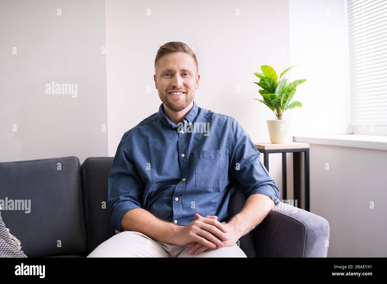 Young happy man home hi-res stock photography and images - Alamy