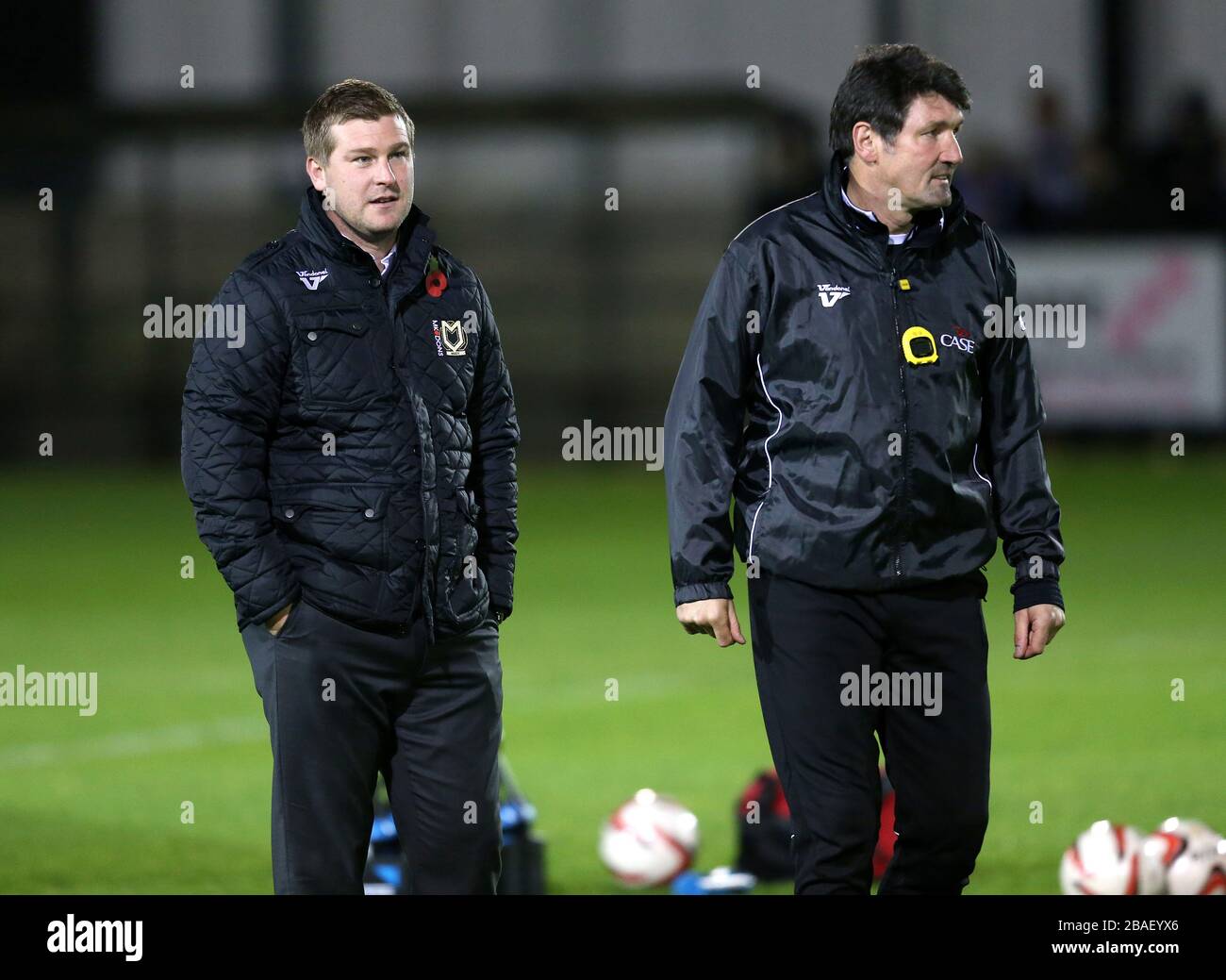 Milton Keynes Dons' first team coach Mick Harford with manager Karl ...