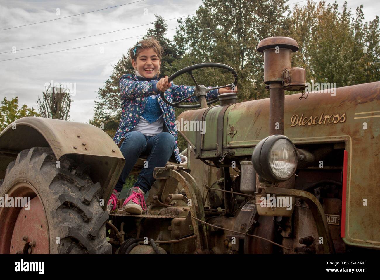 Driving tractor youth hi-res stock photography and images - Alamy