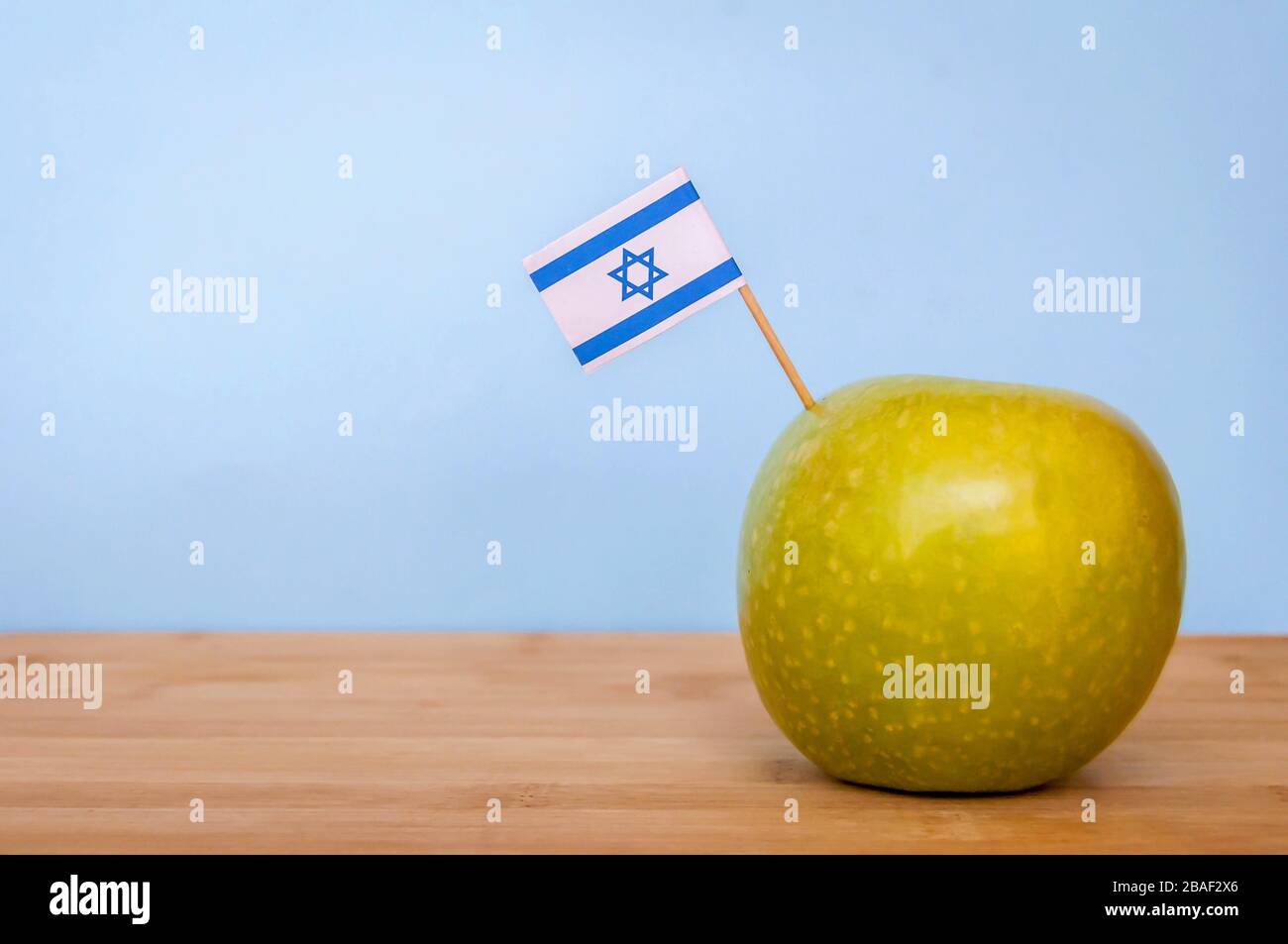 Granny Smith green apple grown in Israel with a little Israeli flag ...