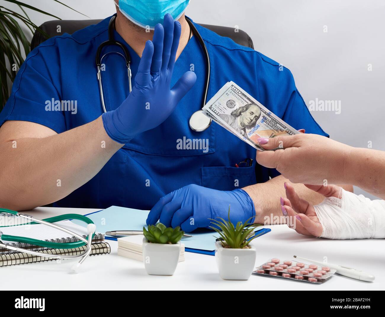 Man holding out hand stop hi-res stock photography and images - Alamy