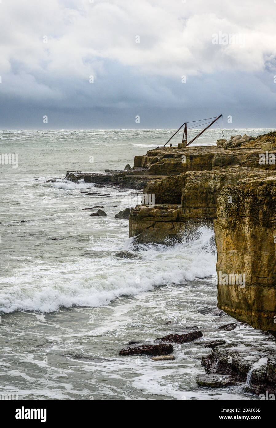 Portland Bill - cliffs and crane Stock Photo - Alamy