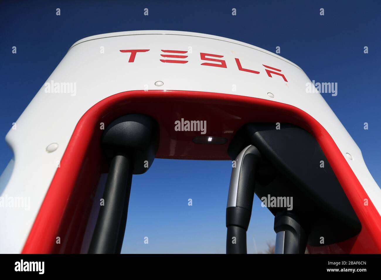 An electric charging port for a Tesla in Leicester Stock Photo - Alamy