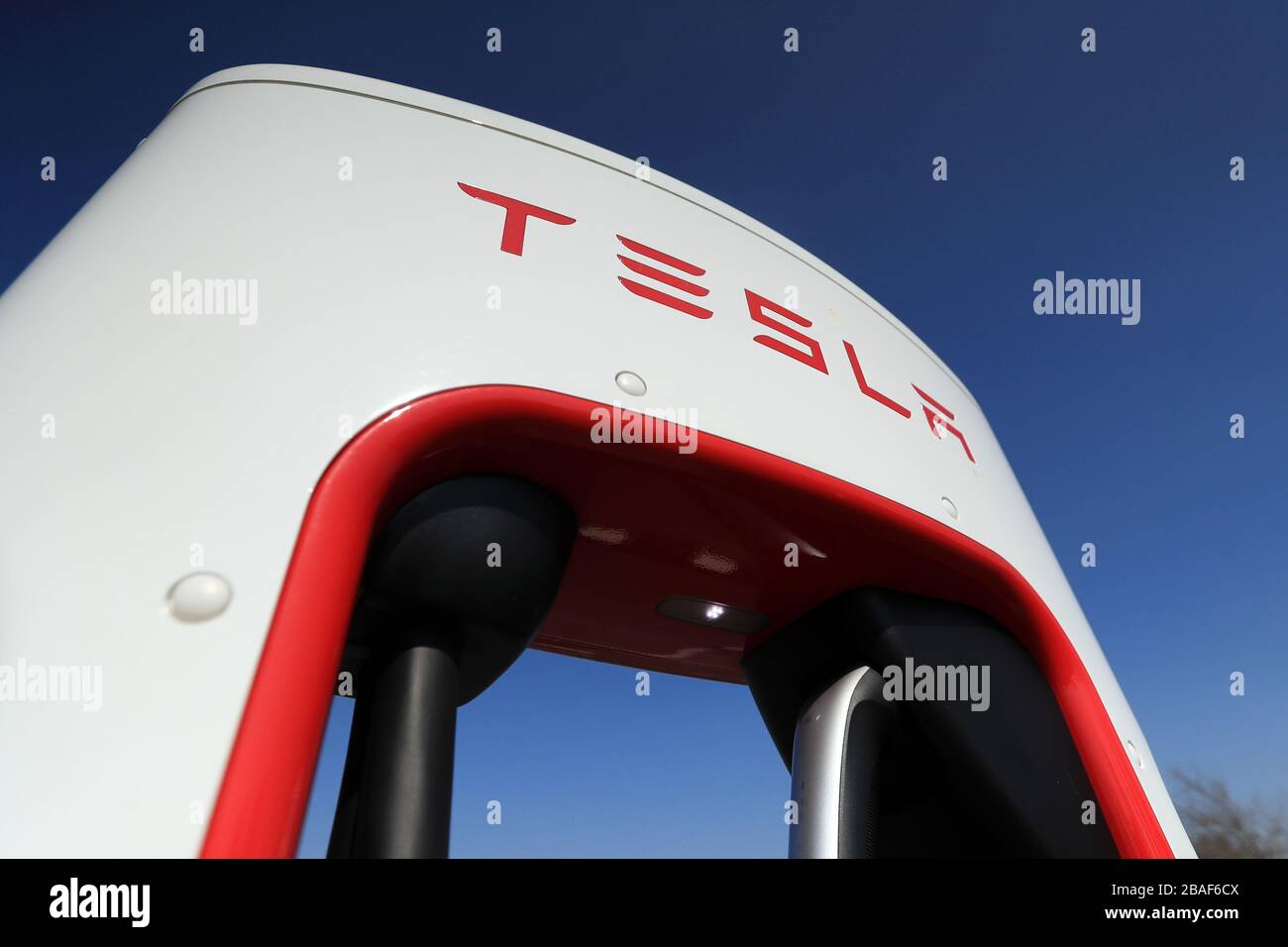An electric charging port for a Tesla in Leicester Stock Photo - Alamy