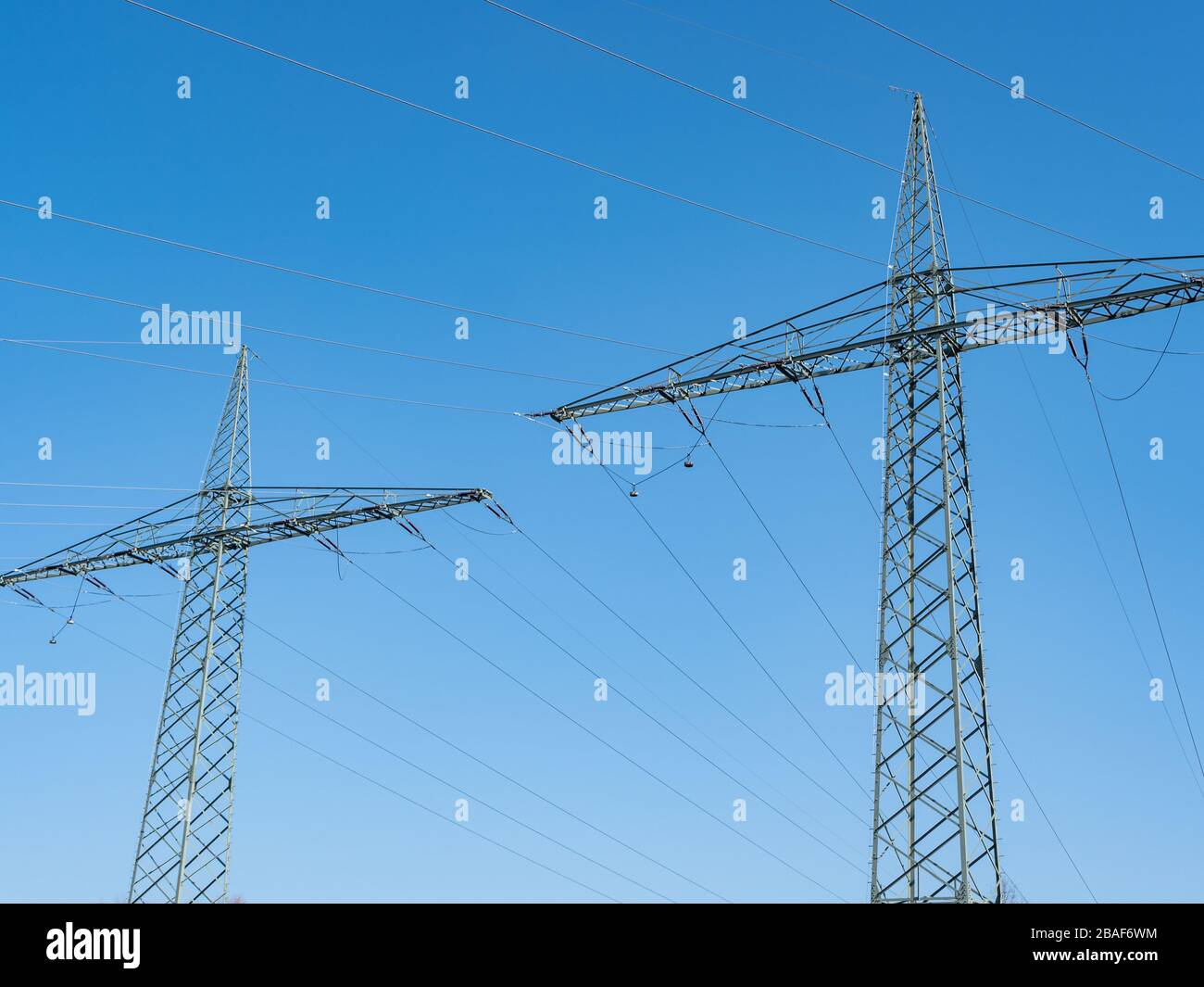 High voltage power lines towering hi-res stock photography and images ...