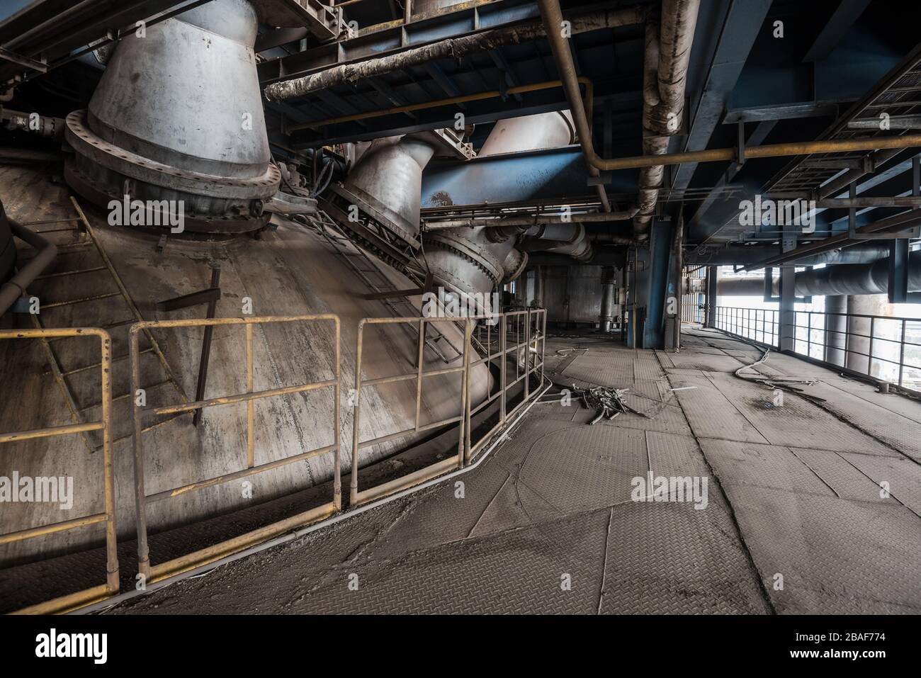 Interior of an old abandoned industrial steel factory Stock Photo - Alamy