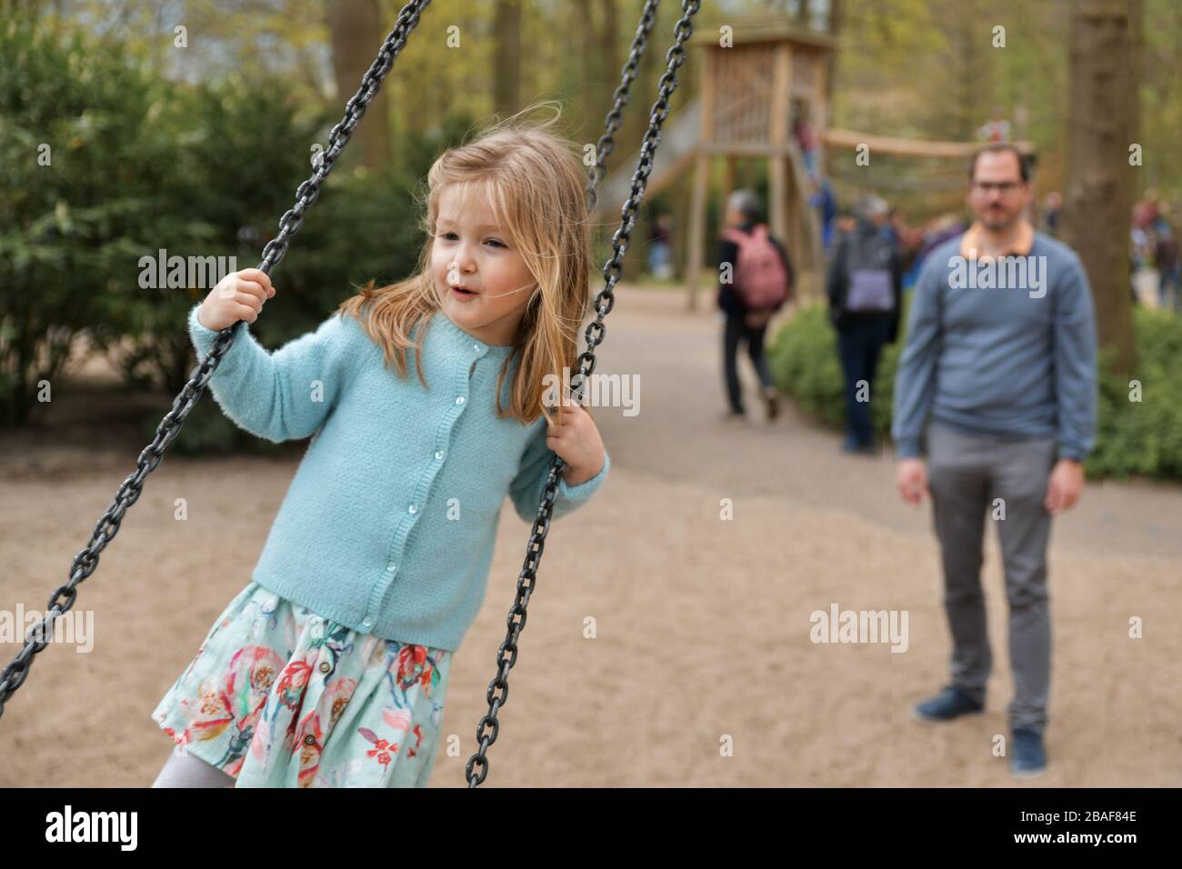 Father and daughter on a swing hi-res stock photography and images - Alamy