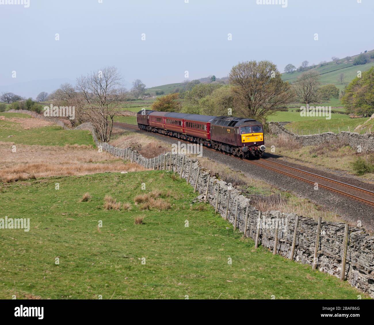 West Coast Railway class 47 locomotive 47851 passing Ings on the single ...