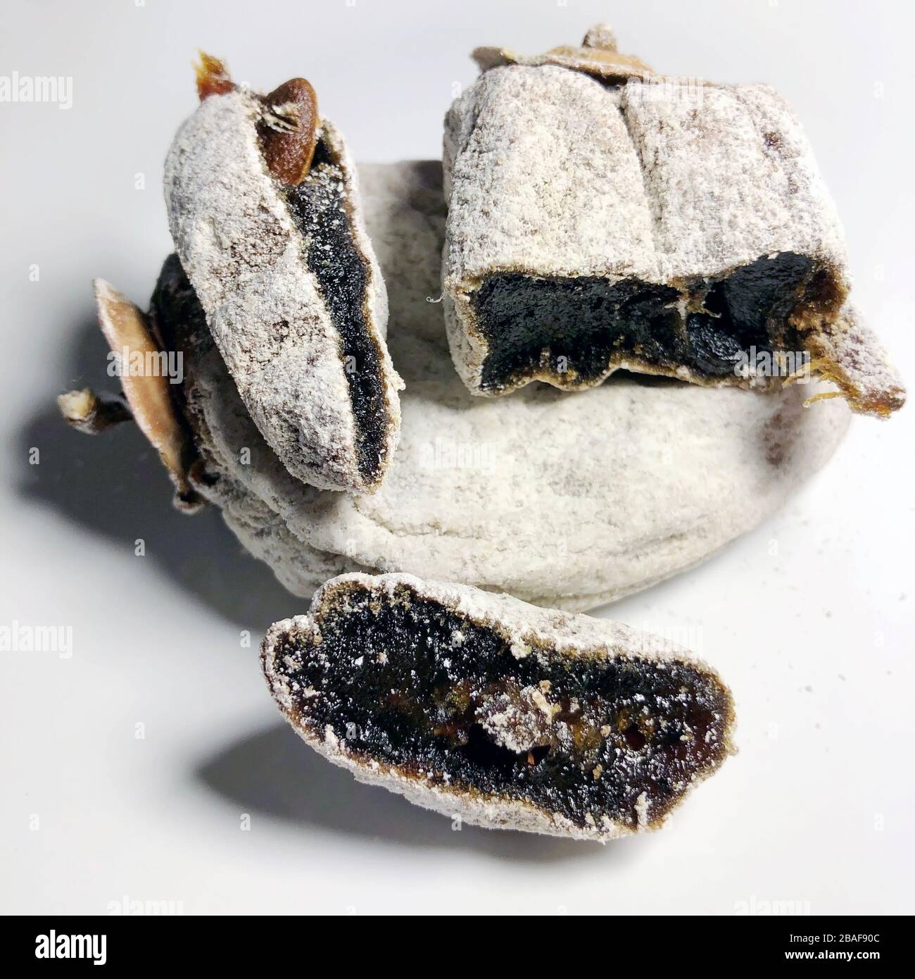 Dried persimmon on plate hi-res stock photography and images - Alamy