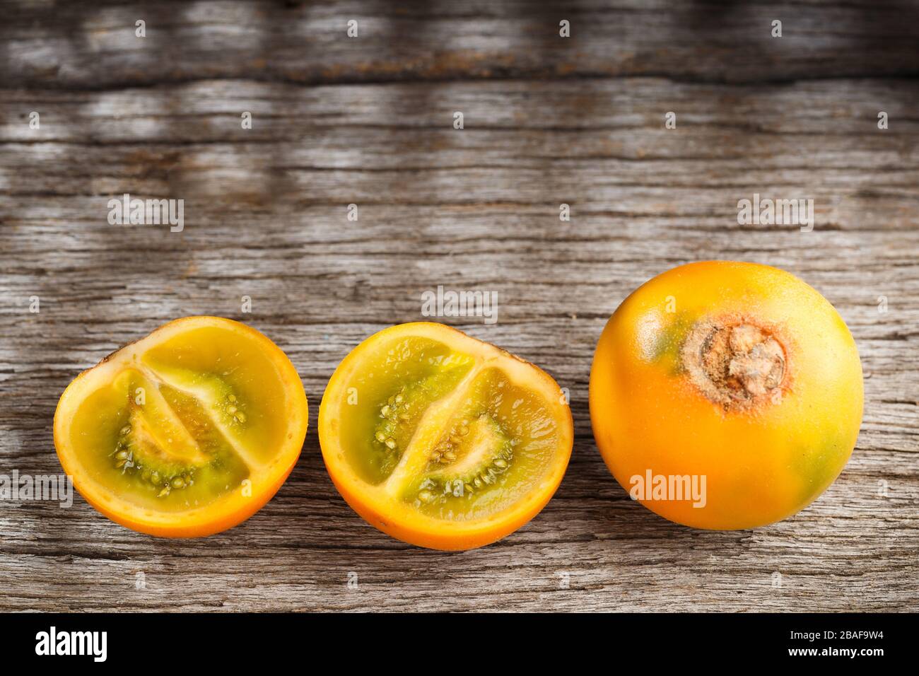 Fruit of lulo or naranjilla on wood subtropical perennial plant of ...