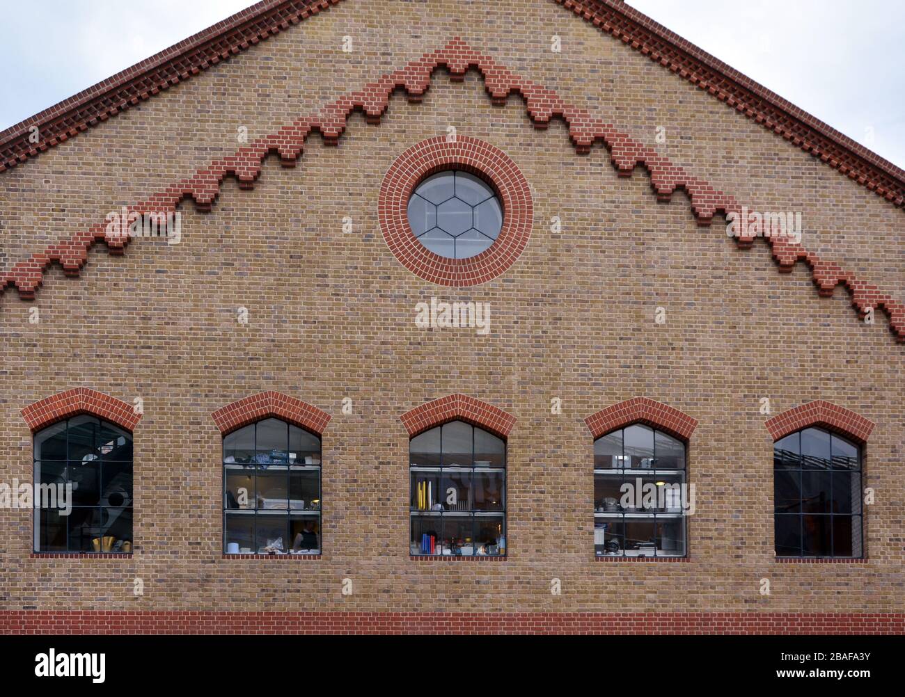 Restored and repurposed old industrial building in London, with two ...