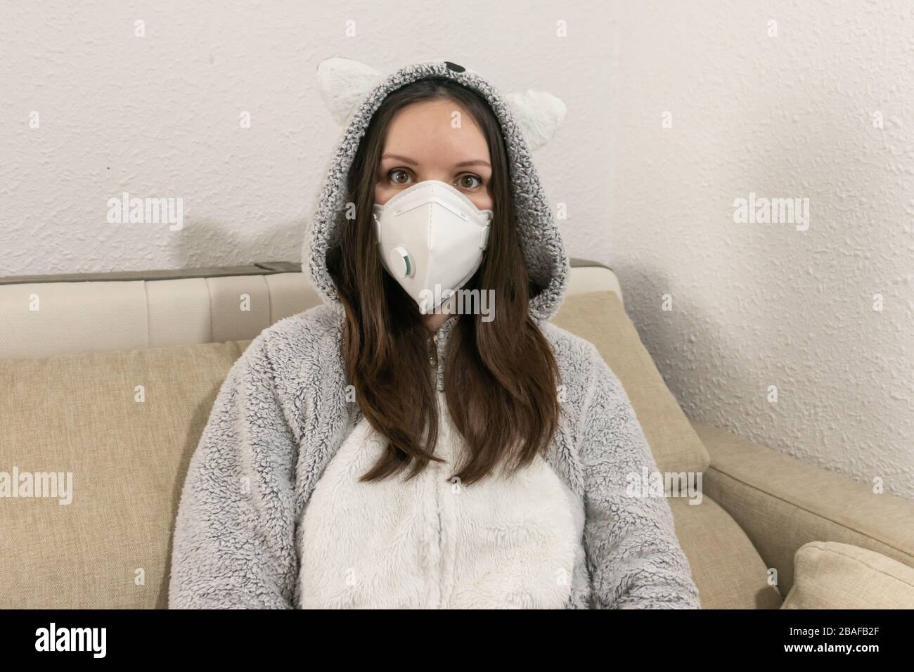 Young caucasian woman portrait in a medical mask pff2 Stock Photo - Alamy