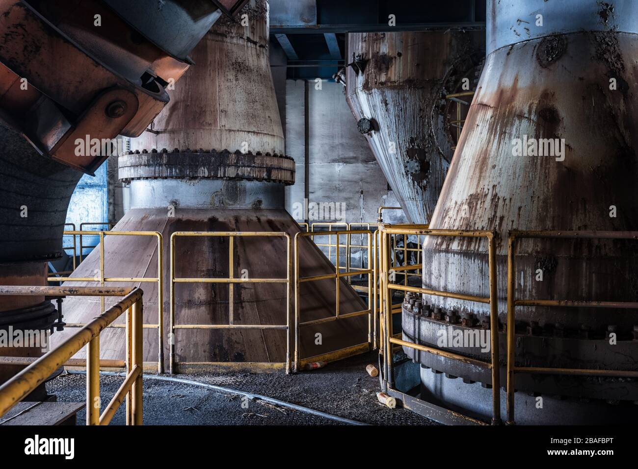 Interior of an old abandoned industrial steel factory Stock Photo - Alamy