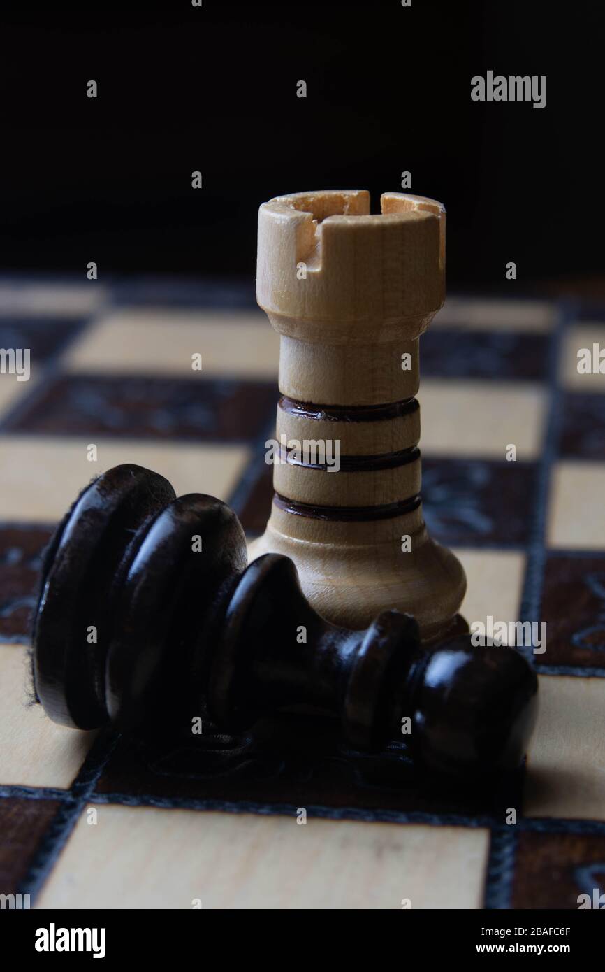 Chess tower standing near pawn. Immunity, resilience, survival and ...