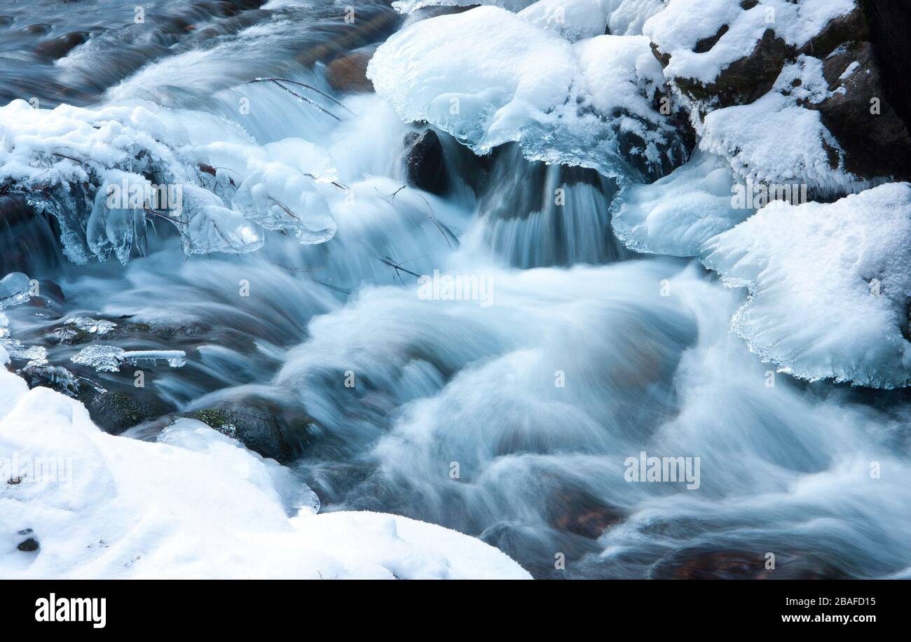 scene with winter mountain stream Stock Photo - Alamy