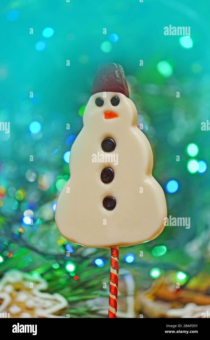 Snowman made of sugar candies. Merry Christmas and happy New Year ...
