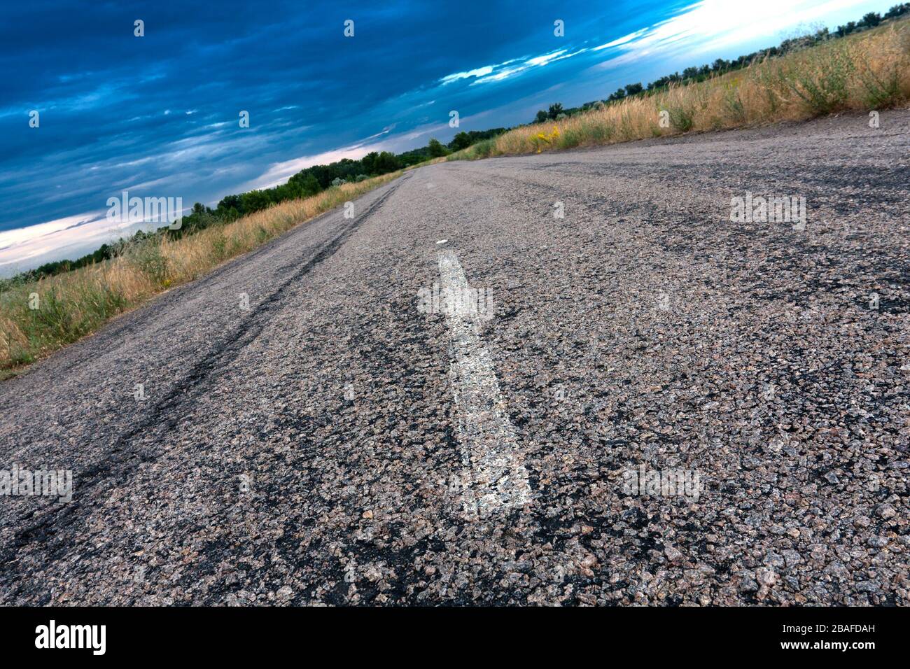 free asphalt road on steppe before thunderstorm Stock Photo - Alamy