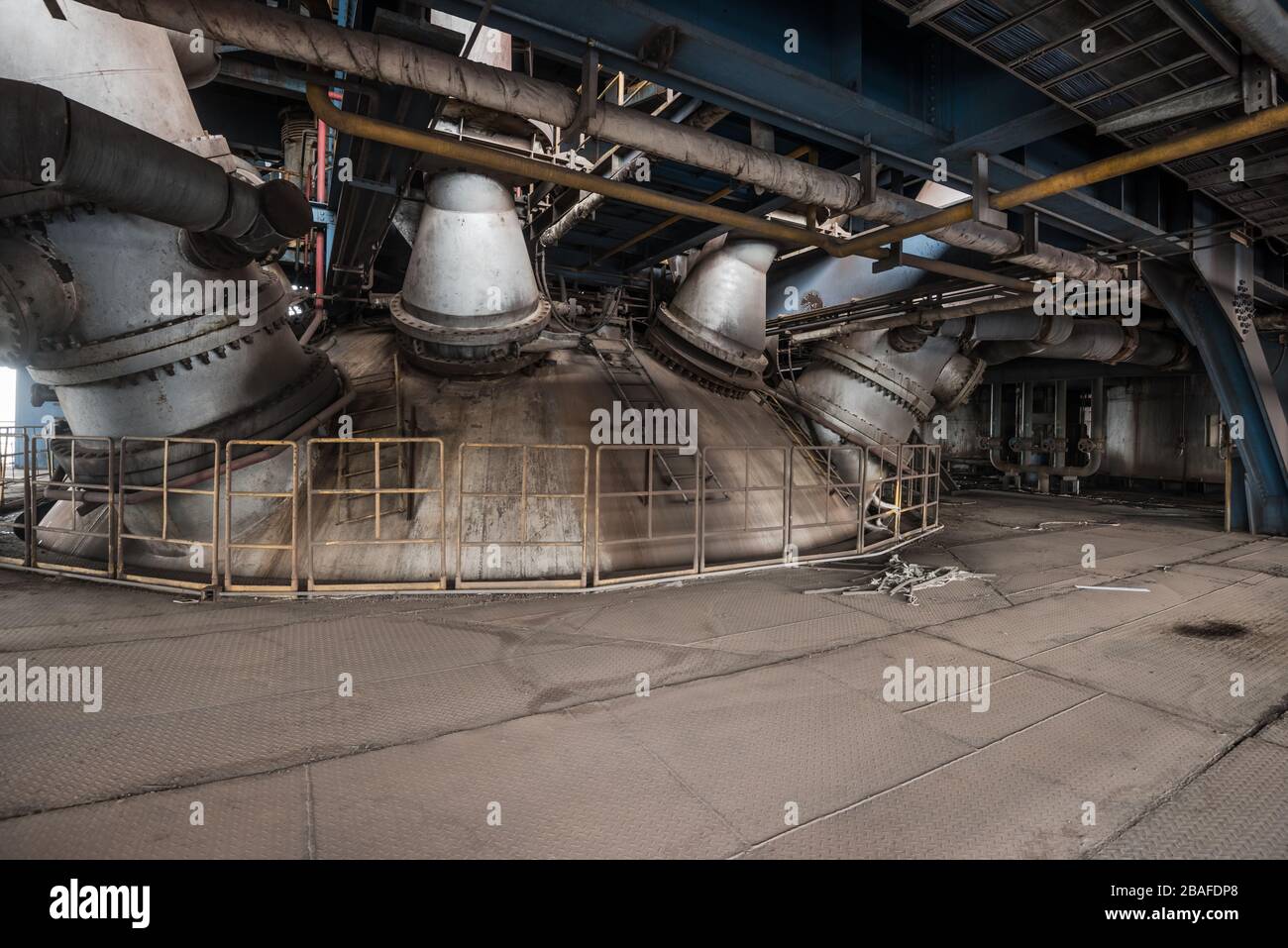 Interior of an old abandoned industrial steel factory Stock Photo - Alamy