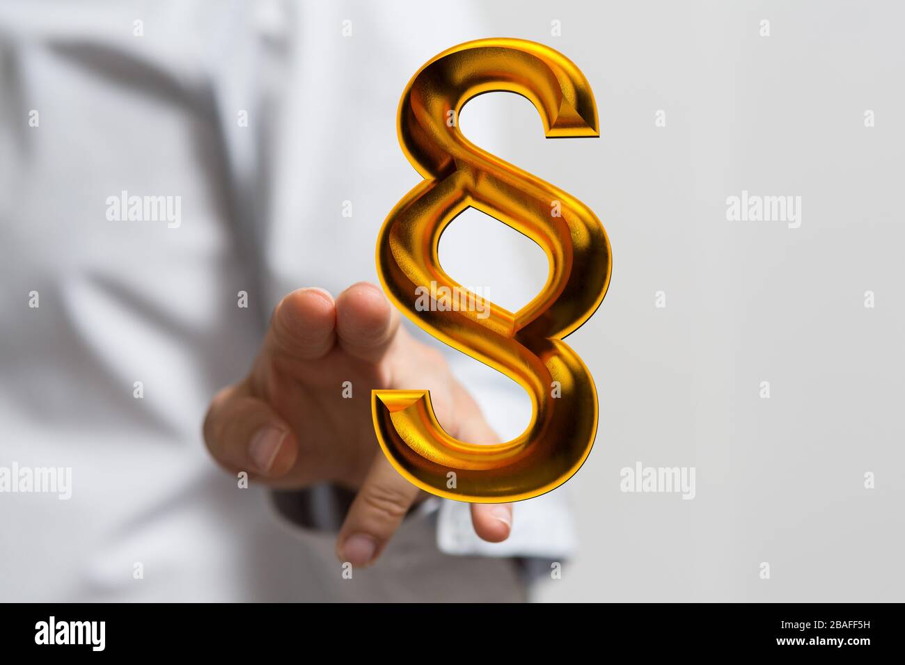 A paragraph law sign digital in hand Stock Photo - Alamy