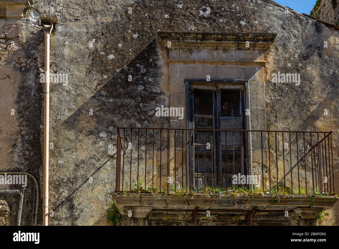 windows in the facades of ancient medieval houses Stock Photo - Alamy