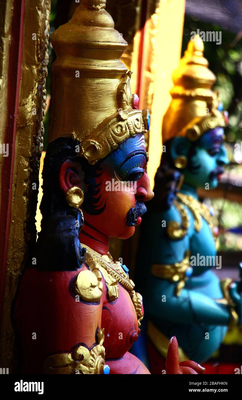 Guardian deity outside hindu temple hi-res stock photography and images ...