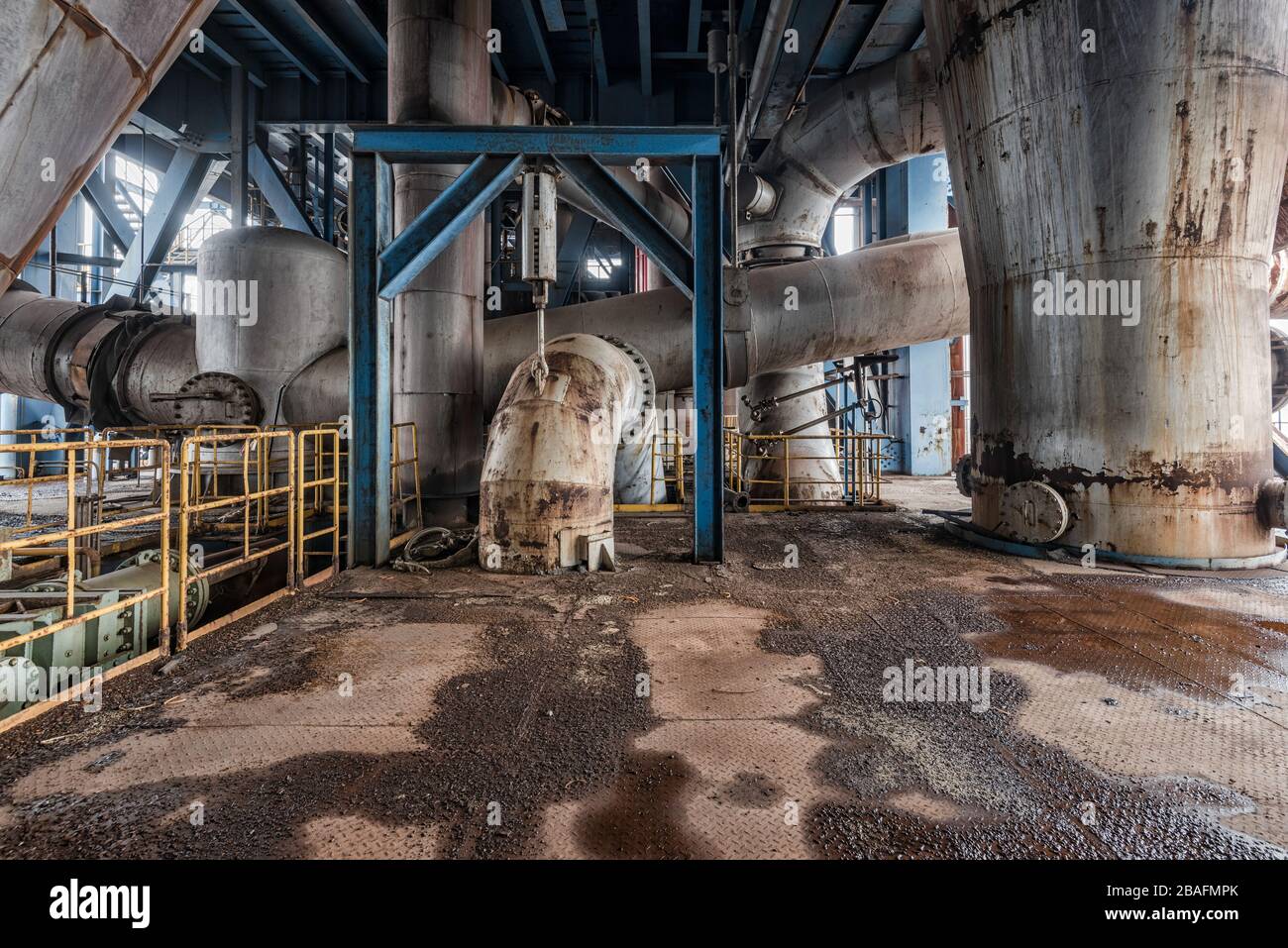 Interior of an old abandoned industrial steel factory Stock Photo - Alamy