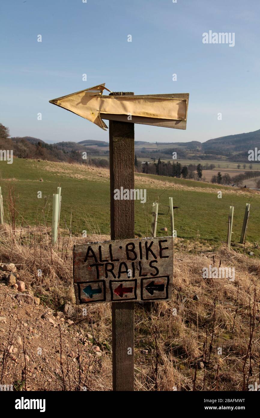 Wooden sign for mountain bike trails Stock Photo - Alamy
