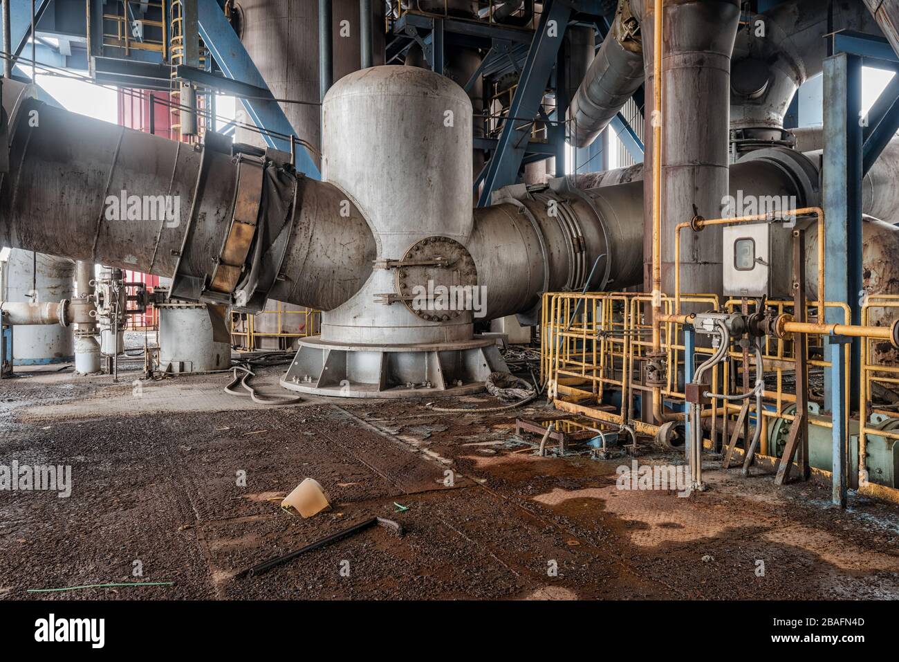 Interior of an old abandoned industrial steel factory Stock Photo - Alamy